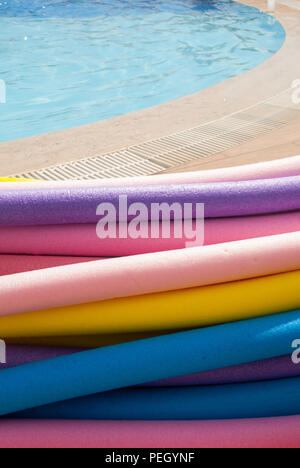 colorful swim noodles floating swimming pool Stock Photo - Alamy