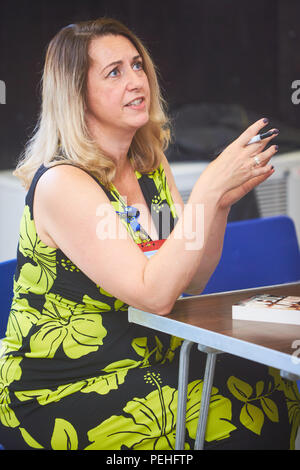 Stephanie Marland (L) writing as Steph Broadribb, signs books for fans ...