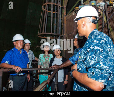 Shown from left to right are Adm. Steven D. Poulin, U.S. Coast Guard ...