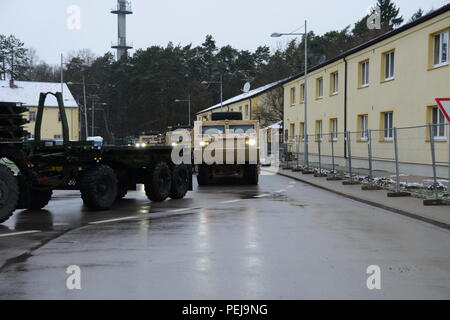 On a cold, rainy morning, U.S. Soldiers in a convoy from the 240th ...