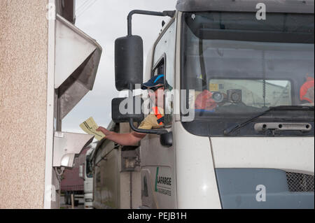 A lorry checks out at the weighbridge at Whitwell Quarry Stock Photo ...