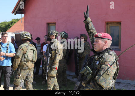 Soldiers of the Parachute Regiment, 6th Airborne Division, on a German ...