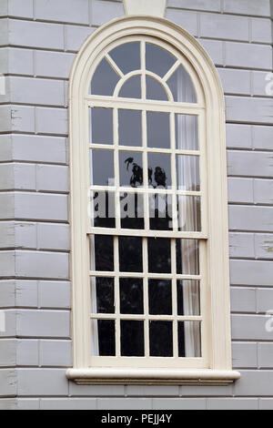 Round window at Colonial Williamsburg building in Virginia. A living ...
