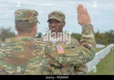 Chief Warrant Officer and his son, a Sergeant, configure individual ...
