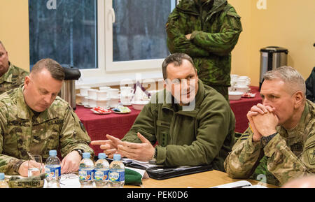 Lt. Gen. John M. Murray is pinned to general by his wife, daughter and ...