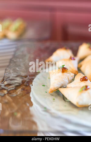 Canapes on a glass plate Stock Photo - Alamy