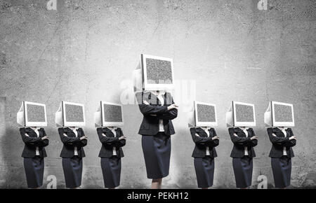 Business women with monitors instead of head Stock Photo - Alamy