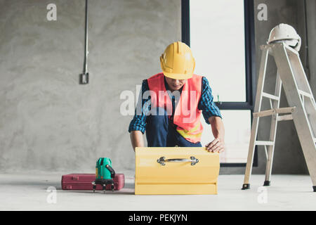 worker finding tools in construction box in wrepair worke in working ...