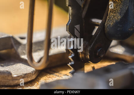 electric saw to cut the macrophotography strap Stock Photo - Alamy