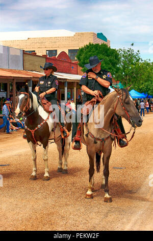 Two Arizona Rangers on horseback ride along E Allen St at the annual ...