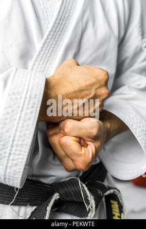 Closeup of karate fighter making a fist Stock Photo - Alamy