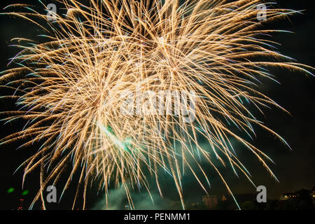 Colorful fireworks of various colors over night sky Stock Photo - Alamy