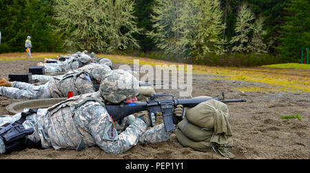 U.S. Military issued M4 carbine rifles are lined up and ready for ...