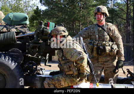 A gun chief and his assistant gunner assigned to the 82nd Airborne ...