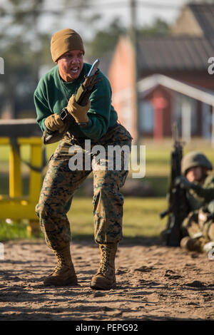 Sgt. Trelaine S. Buffaloe, a martial arts instructor, motivates Rct ...