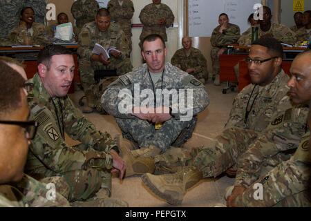 Sgt. 1st Class Joseph Dale (right), an aviation plans noncommissioned ...