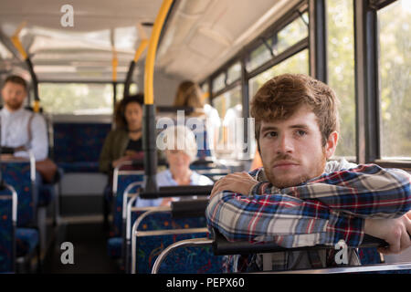 Man travelling in modern bus Stock Photo - Alamy