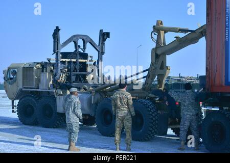 Soldiers at the supply support activity warehouse inventory equipment ...