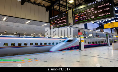 TOKYO, JAPAN - APRIL 21 2018: Interior of Japanese Shinkansen high speed train platform in a ...