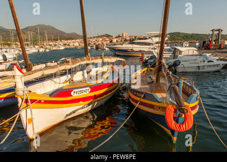 Traditional Catalan fishing boats moored in the harbour of Collioure ...