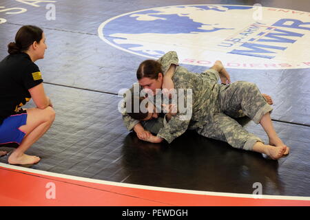 Sgt. Jessica Garrett, left, and Spc. Justin Siler, Soldiers from the ...