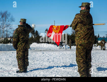 Marines with 5th Marine Regiment salute during a French Fourragere ...
