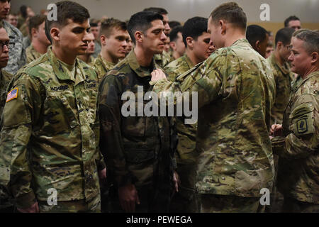 Lt. Col. Michael F. Kloepper (right), outgoing commander of 2nd ...