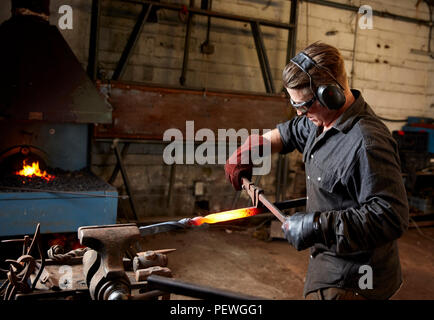 Male Blacksmith Wearing Protective Safety Visor Arc Welding Metalwork ...