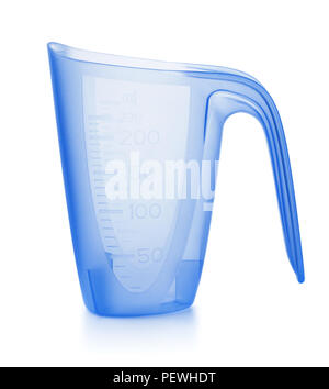 Washing laundry detergent powder and blue plastic measuring cup, top ...