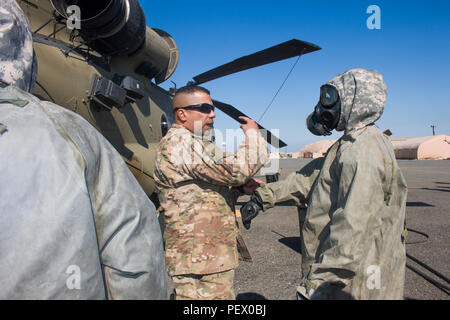 Army Reserve CBRN platoon sergeant briefs Soldiers during a CH-47 ...