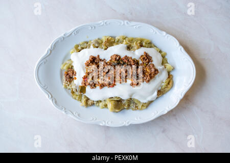 Turkish Ali Nazik Kebab with Yogurt, Minced Meat and Roasted Eggplant ...