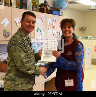 Lt. Col. Michael Epper, 341st Force Support Squadron commander, places ...