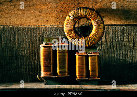Three old copper wire coils Stock Photo - Alamy