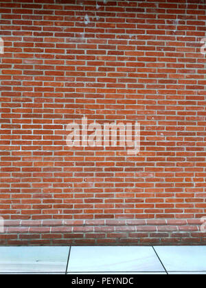 Newly built plain brick wall using reclaimed bricks at large country ...