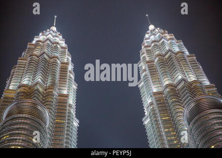 a big asia city by night to the sunrise with all the lights on the ...
