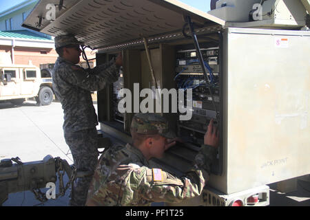 Spc. Brandon McClure (left), a Command Post Node operator and Sgt ...