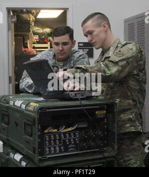 Spc. Brandon McClure (left), a Command Post Node operator and Sgt ...