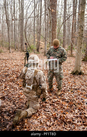 Officer Candidates Class-221 operate as a fire team to climb the tower ...