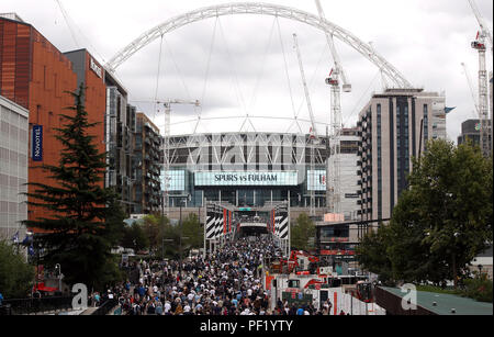 General view of the arch of Wembley Stadium silhouetted against the sky ...