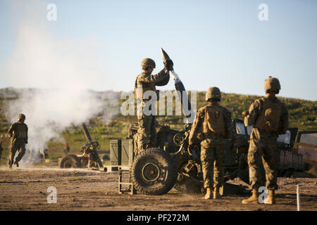 U.S. Marines fire an M327 120mm towed mortar system during a ...