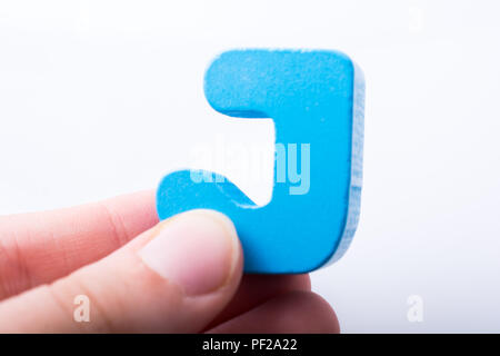 Hand holding Letter cube X of Alphabet Stock Photo - Alamy