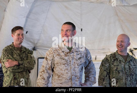 U.S. Army Col. Eric Lopez, left, the Strike Ready Force commander of ...