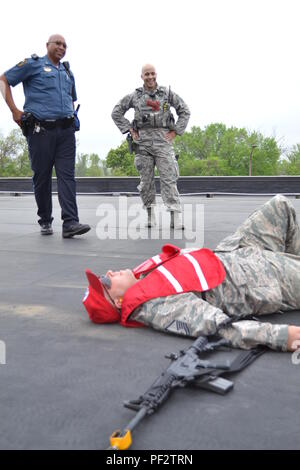 Members of the 201st RED HORSE Det.1 stands at parade rest during the ...