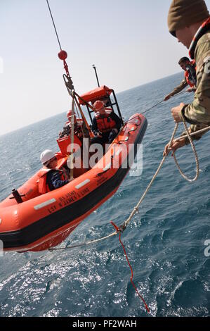 Army mariners from the 1099th Transportation Detachment load an Army ...