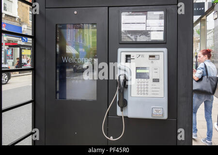 New World public payphones on Putney High Street, London, UK Stock ...