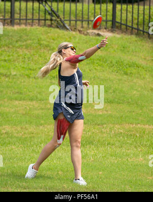 Navy Intelligence Specialist Cassidy Busch demonstrates by throwing a ...