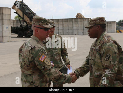 Brigadier Gen. Michael T. Morrissey and Command Sgt. Maj. Eric R ...