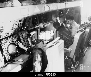 ASW-sensor operators in Lockheed P-3 Orion in August 1966 Stock Photo ...