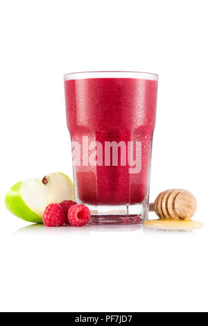 Glass of fresh organic apple and raspberry juice with fresh fruits in ...