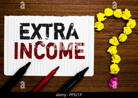 Handwriting text Extra Income. Concept meaning Additional fund received ...
